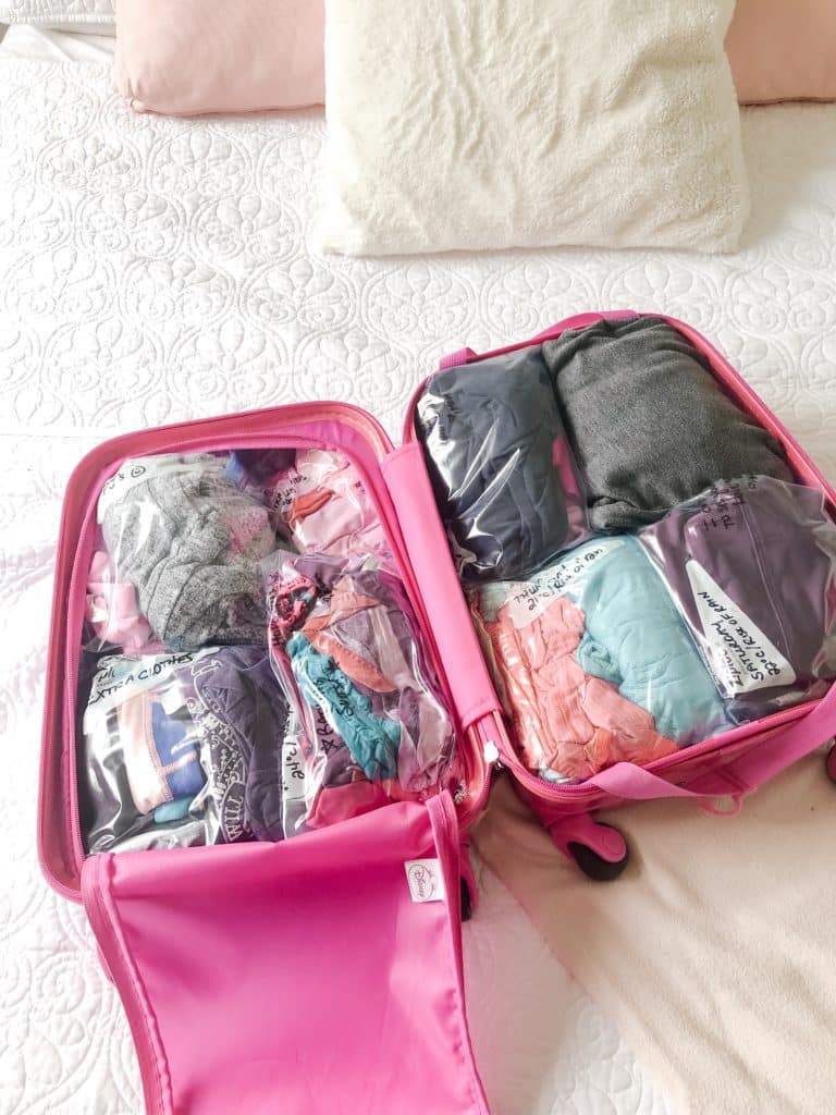 Simple Packing Tips and Tricks - Organized With Kids